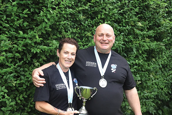 Couple lift their game at champs